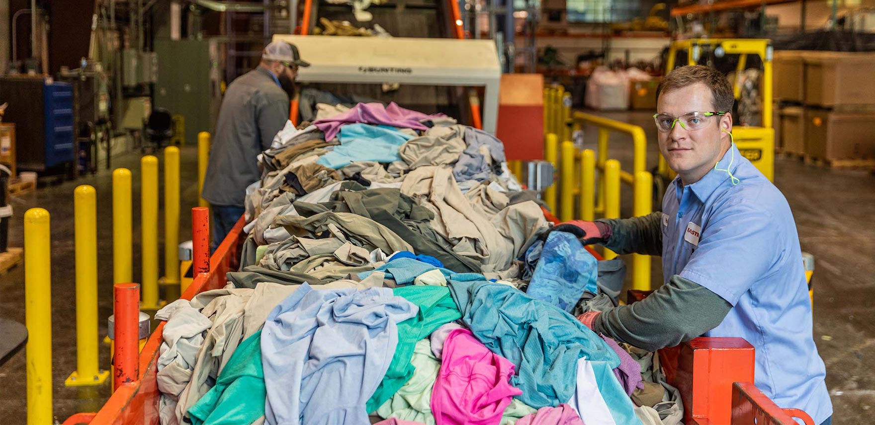 Debrand Collaboration to Recycle Apparel Waste | Eastman